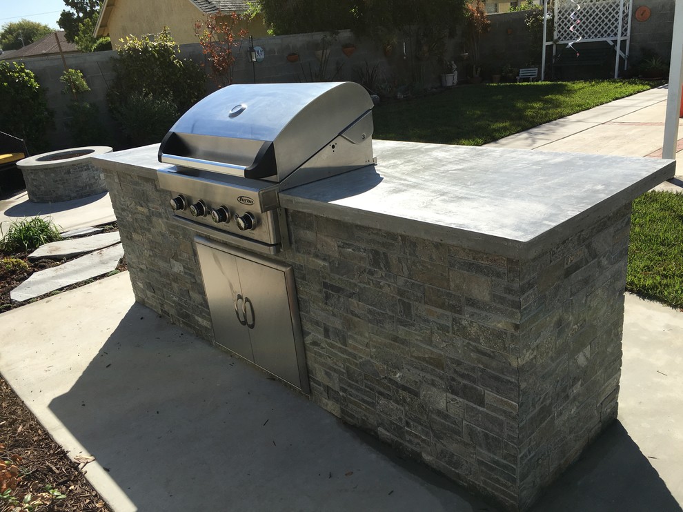 BBQ with real stone veneer and concrete counter top - Contemporary ...