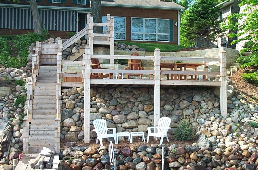 Boulder Sea Wall, Deck & Limestone Seat Wall - Traditional - Landscape ...