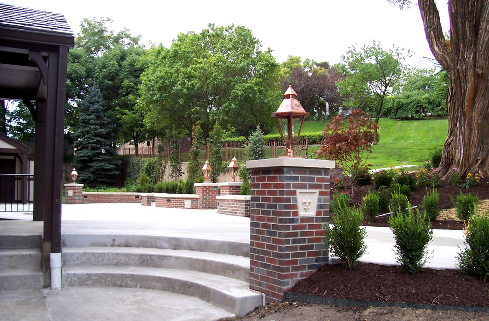 brick walls & columns surround a patio - Traditional - Landscape ...