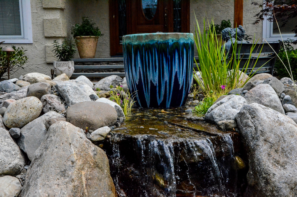 Bubbler adds height to a pondless waterfall - Rustic - Landscape - New ...