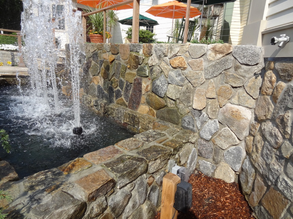 Cape Cod Inn with New England Stone Cladding, Retaining Walls, and ...