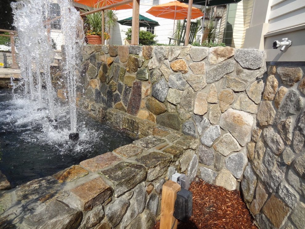 Cape Cod Inn with New England Stone Cladding, Retaining Walls, and ...