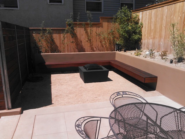 Contemporary Landscape with custom concrete work and stucco retaining ...