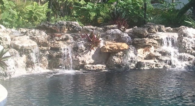 Coral Rock waterfall - Traditional - Landscape - Miami - by Matthew ...
