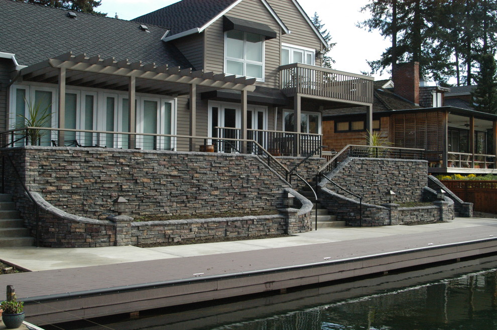 Cultured Stone Retaining Wall With Stairs - Traditional - Landscape ...
