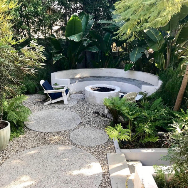 Custom Fire pit, paving and tropical planting - Eclectic - Garden - Los ...