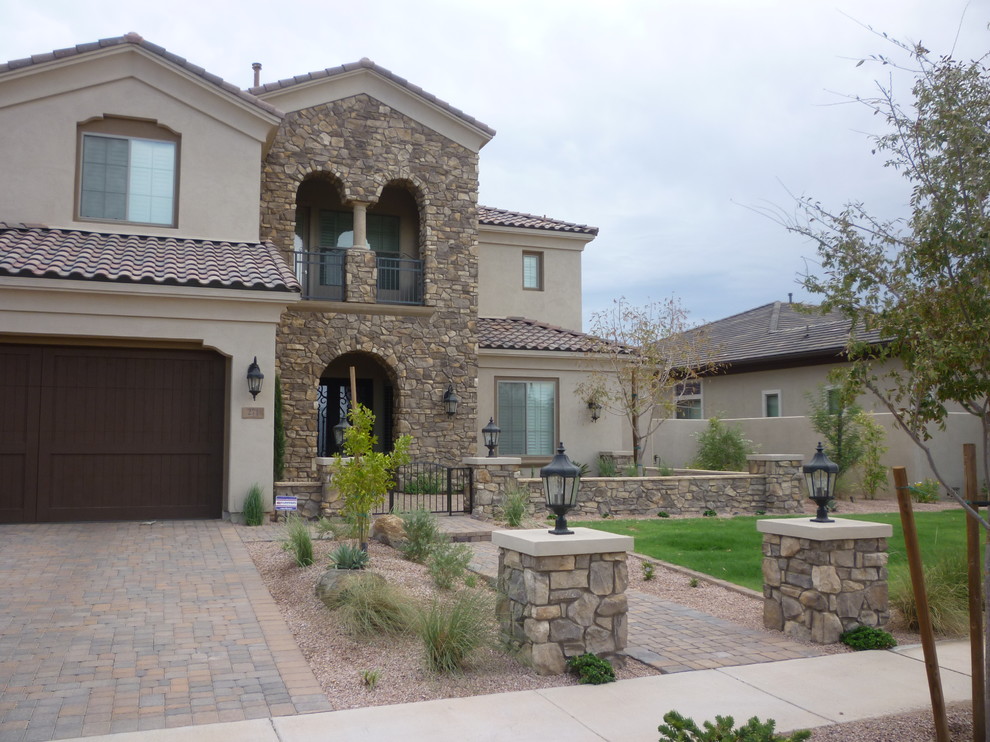 Entry Corridor with Columns, Low Wall, Stone Veneer - Contemporary ...