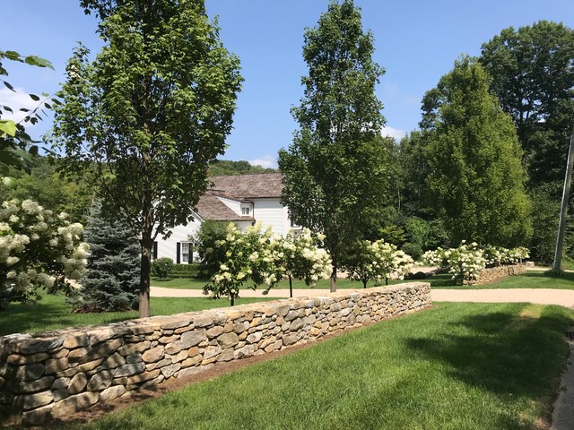 Stone Walls Landscaping With Hydrangeas