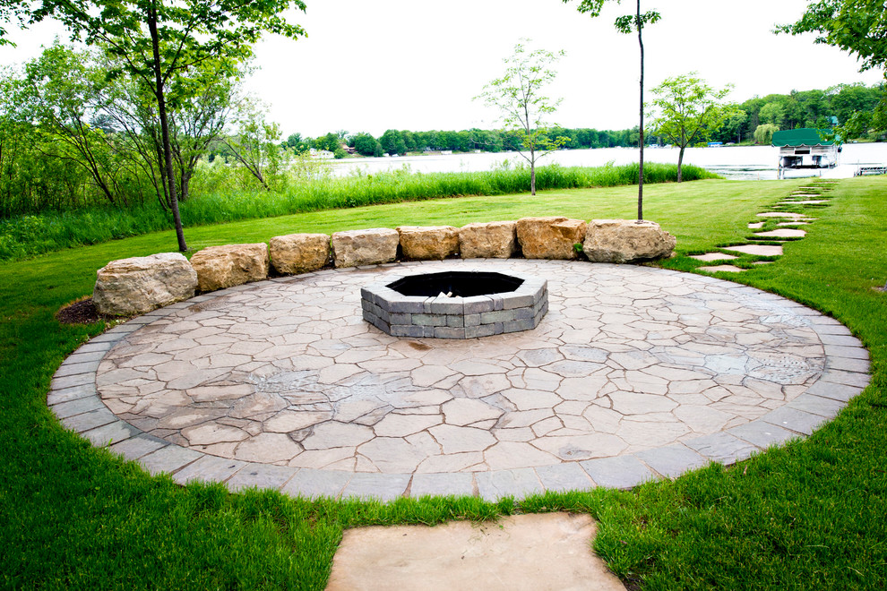 Fire pit ring - Rustic - Patio - Minneapolis - by Backyard Paradise ...