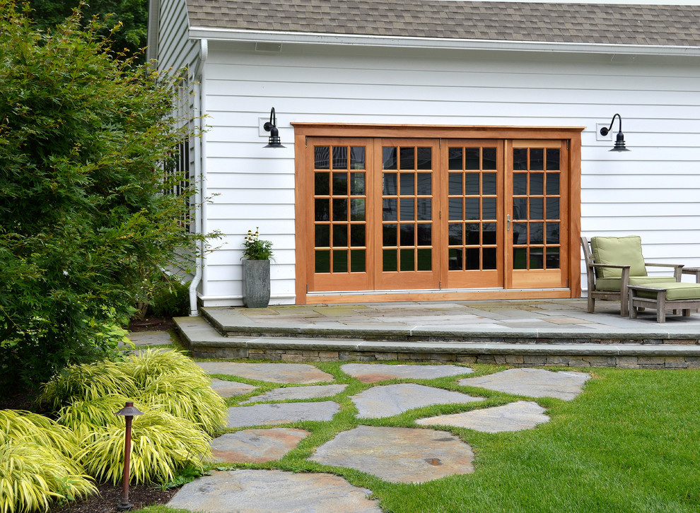 Goshen stone lawn steppers and curved bluestone patio. - Traditional ...