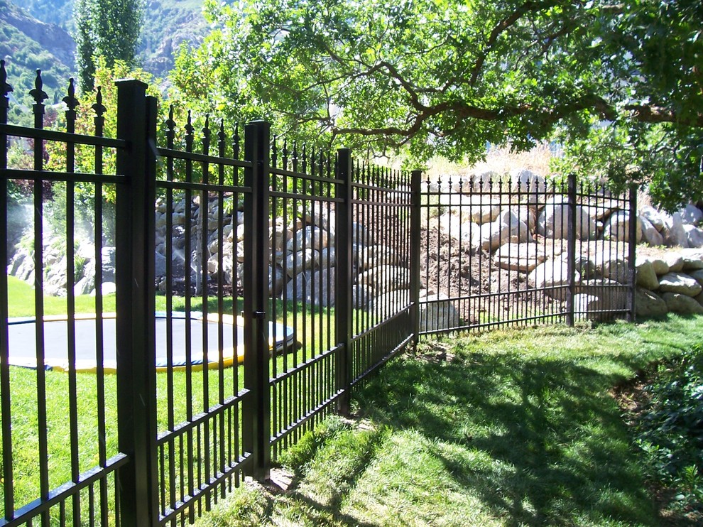 Huntington Fence with Fleur de Lie spear and dog bar - Traditional ...