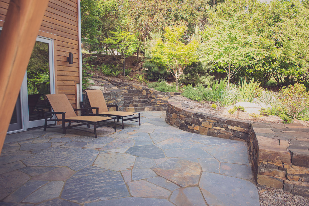 Ledgestone staircase with stacked basalt retaining walls and flagstone ...