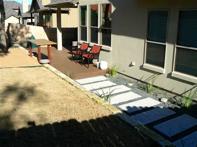 Limestone step pads on texas black gravel lead to cedar deck ...