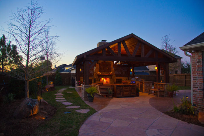Lodge Style Outdoor Living Room - Traditional - Landscape - Houston ...