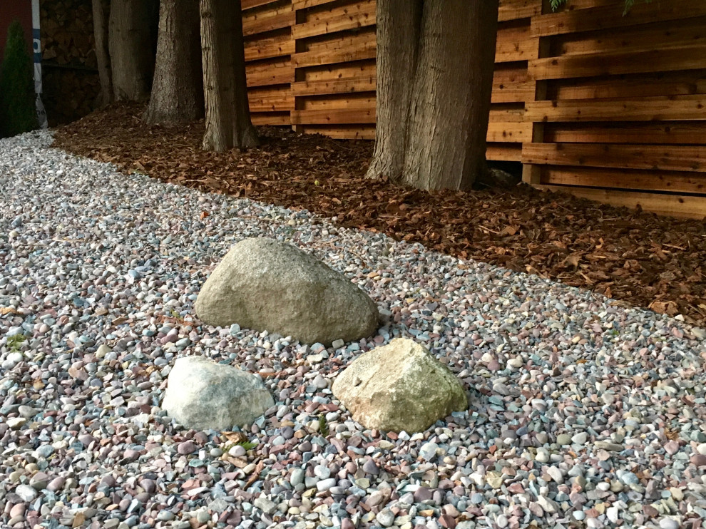 Native site rocks positioned in the gravel river - Modern - Landscape ...