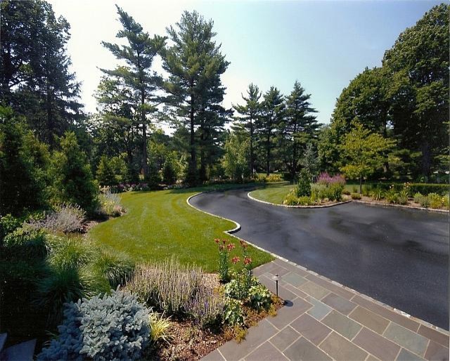 Parking Court and Driveway with Asphalt Paving and Cobblestone Curbing ...