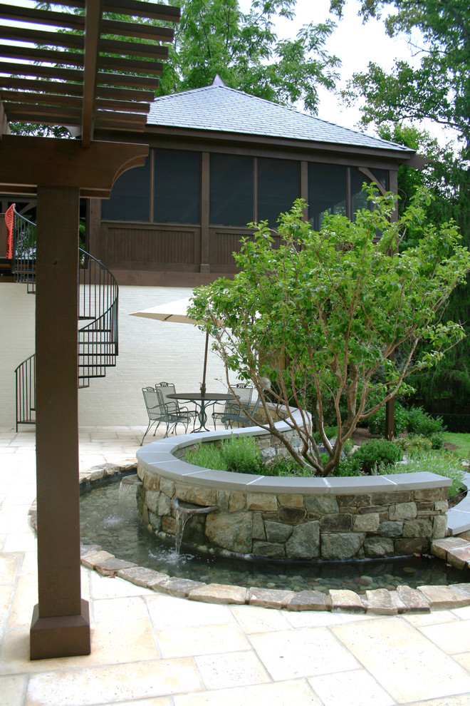 Pond with Flagstone Wall, Pergola and Curved Iron Handrail - Moderno ...