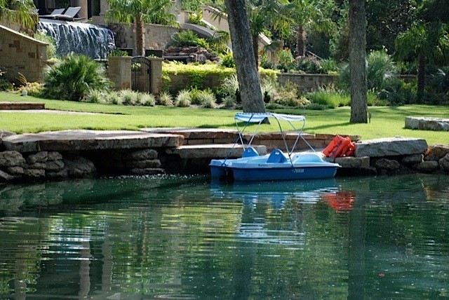 Pond with large ledge stone boat dock - Mediterranean - Landscape ...