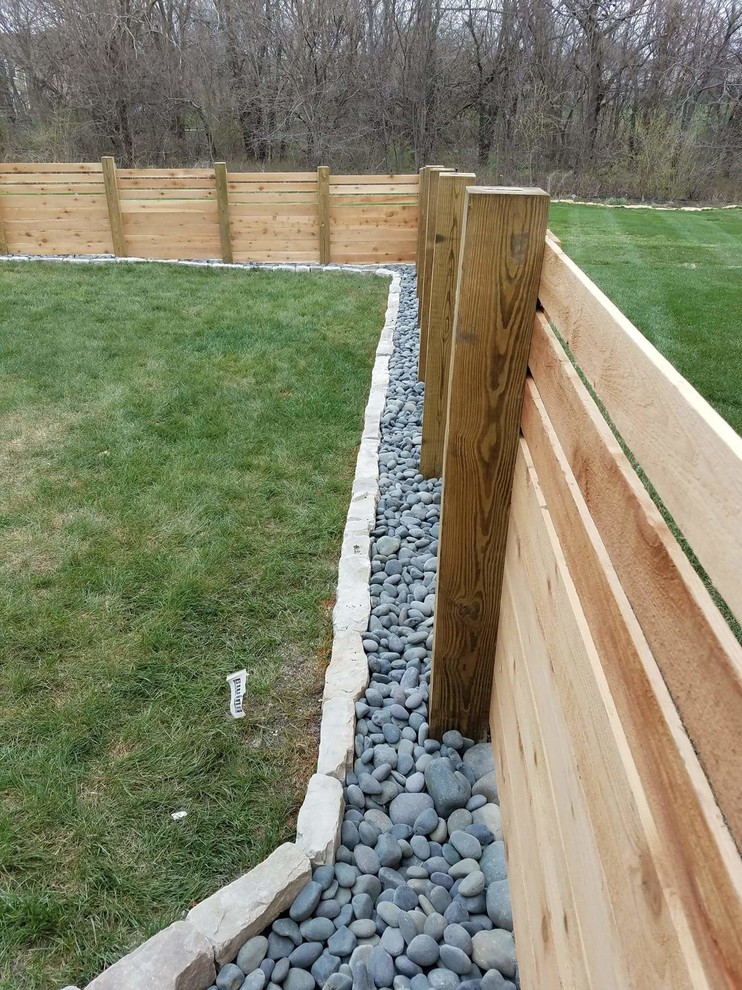 Rock and stone edging around fence - Landscape - Kansas City - by ...