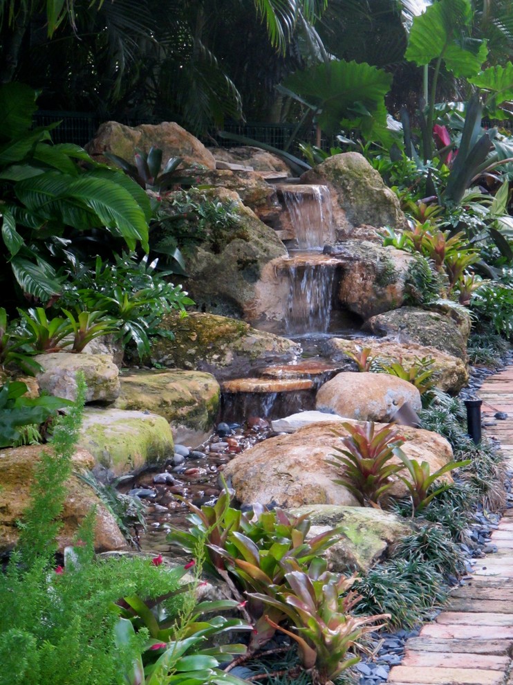 Rock waterfall tropical garden pond - Traditional - Landscape - Miami ...