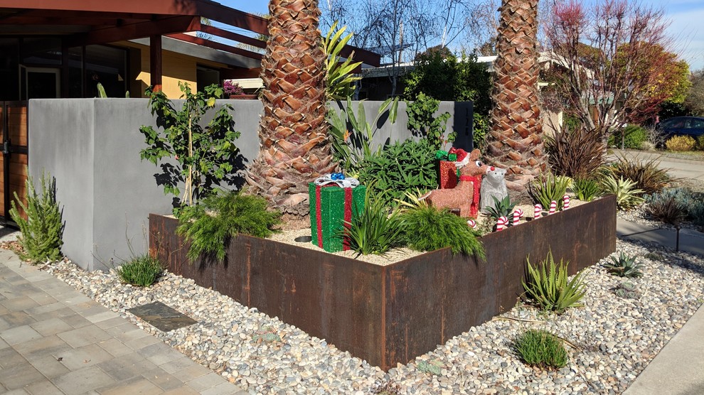 Secured Custom Steel Framed Gates with Slab Accent Garden Wall ...