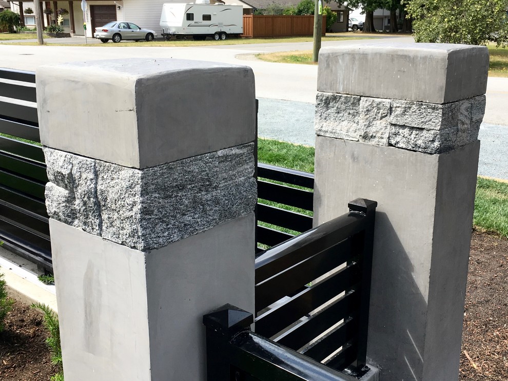 Stone inlay set into the front fence posts - Modern - Landscape ...