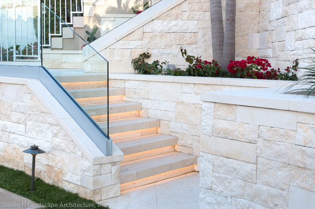 Terraced Backyard with Limestone Stairs and Glass Railing ...