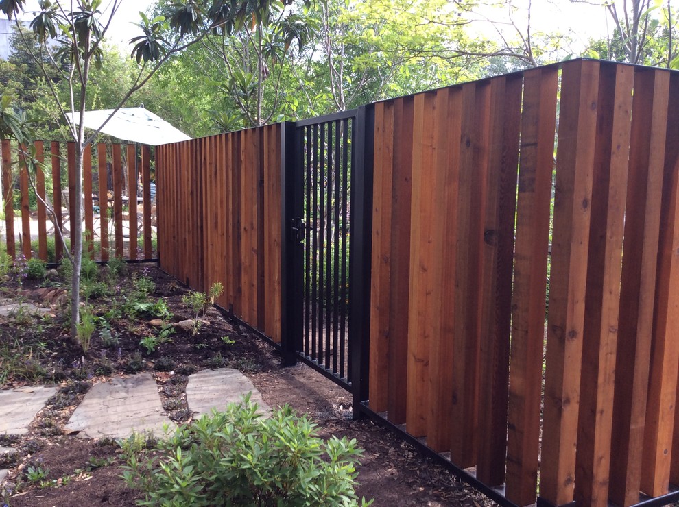 Vertical Wood Fence with Metal Frame - Craftsman - Landscape - Houston ...