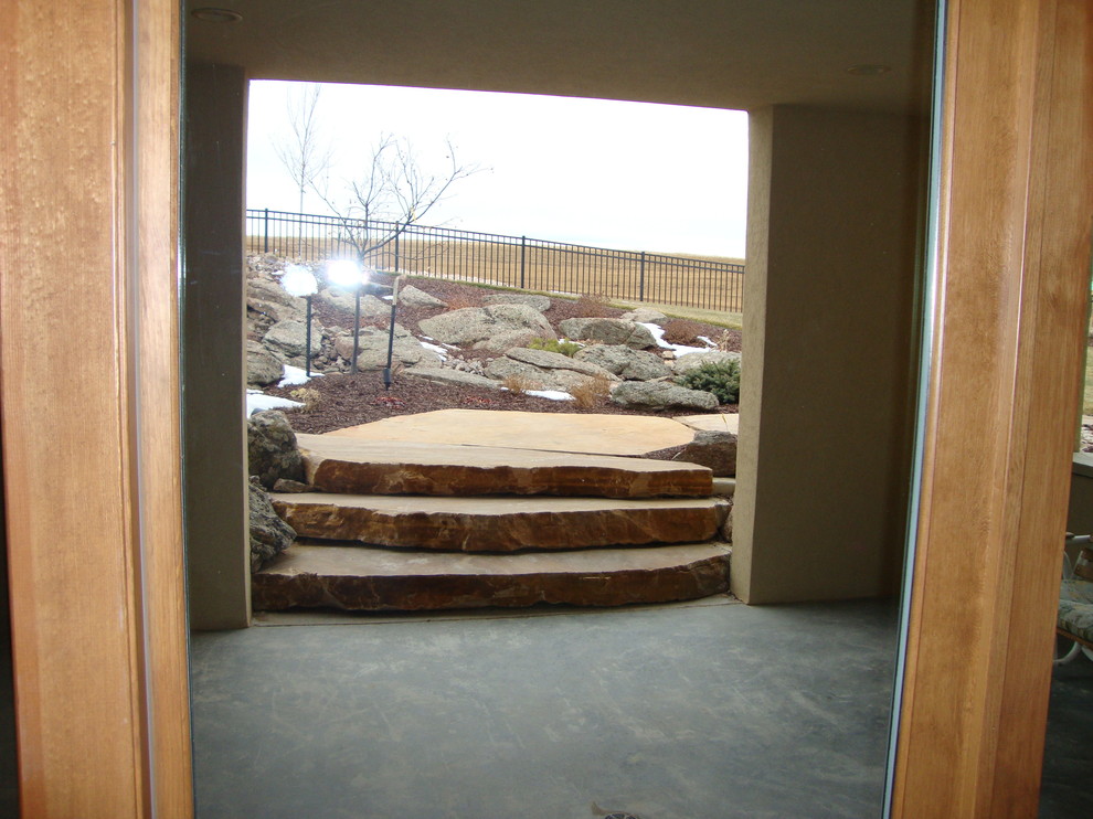 Walk out basement entry from water feature - Traditional - Landscape ...