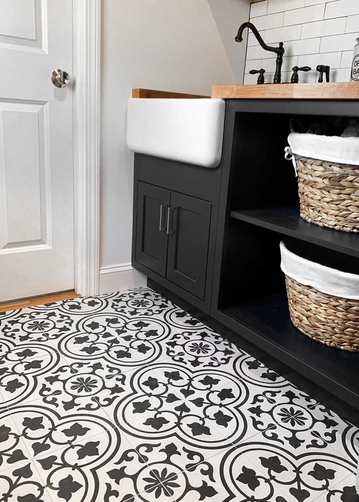 A Modern, Encaustic Tiled Laundry Room - Transitional - Laundry Room ...