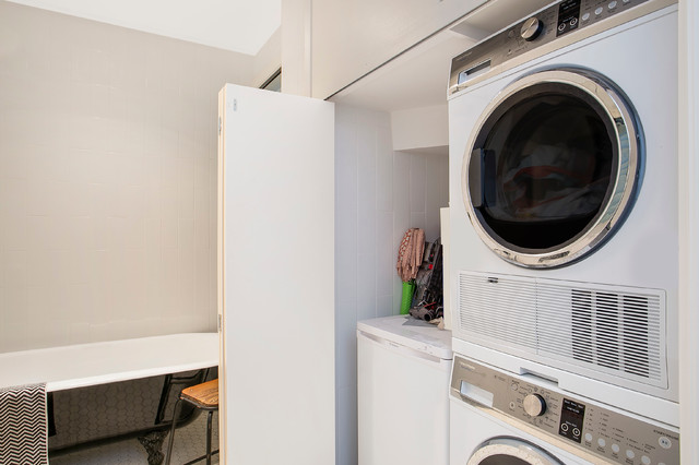 Laundry concealed behind bifold doors - Transitional - Laundry Room ...
