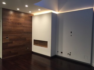 6" solid walnut tongue and groove accent wall. - Rustic - Living Room ...