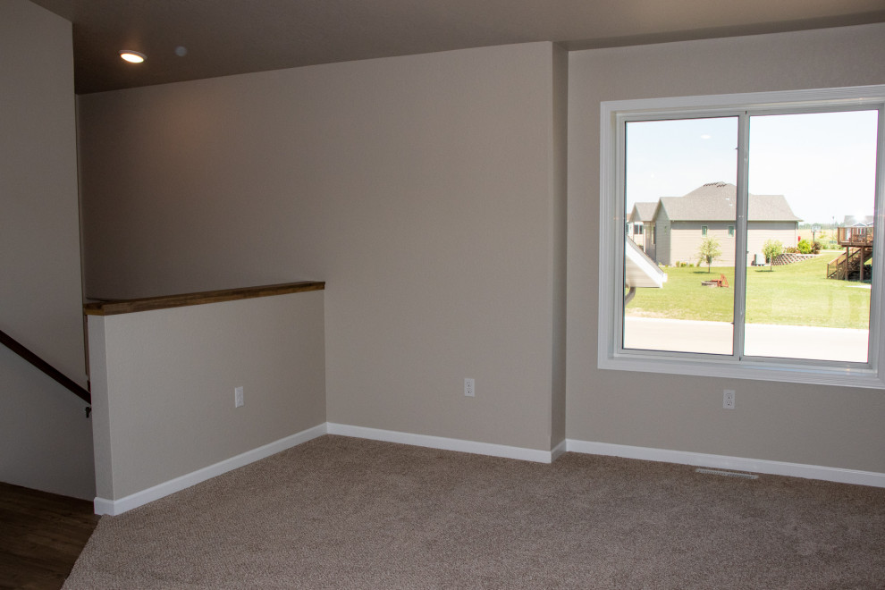 Bi-level Custom Home with Taupe and Cream Color Palette - Traditional ...