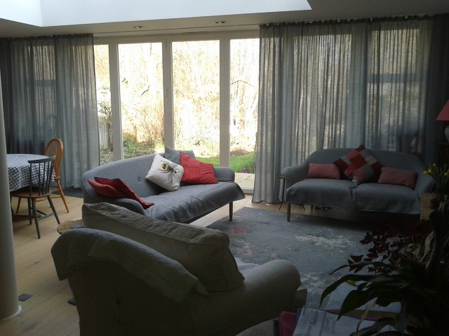 Coloured sheer voiles across bi-fold doors - Modern - Living Room ...