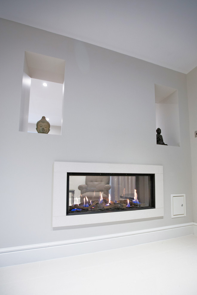 Contemporary double side fireplace - Modern - Living Room ...