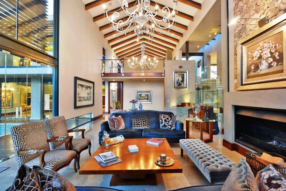 Double volume living room, custom chandeliers and furniture ...