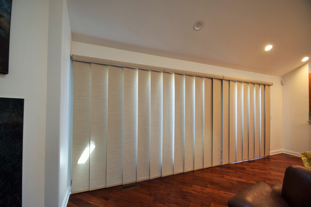 Hunter Douglas Skyline® Gliding Window Panels in Living Room of ...