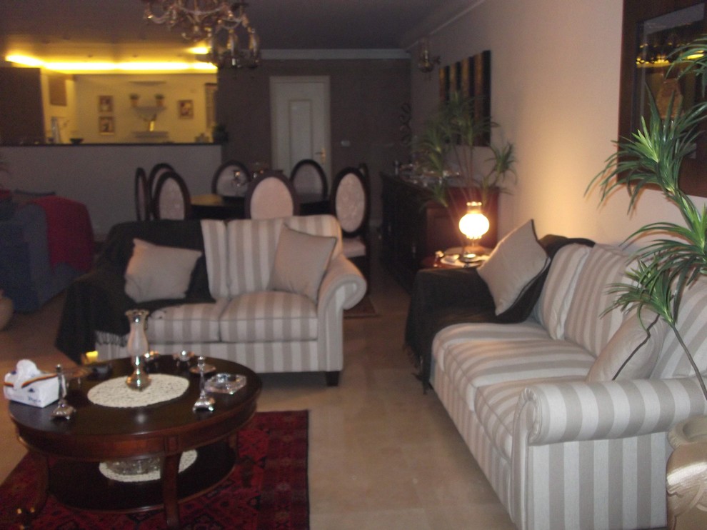 linen tones with iranian red carpet and some silver accesories give a ...