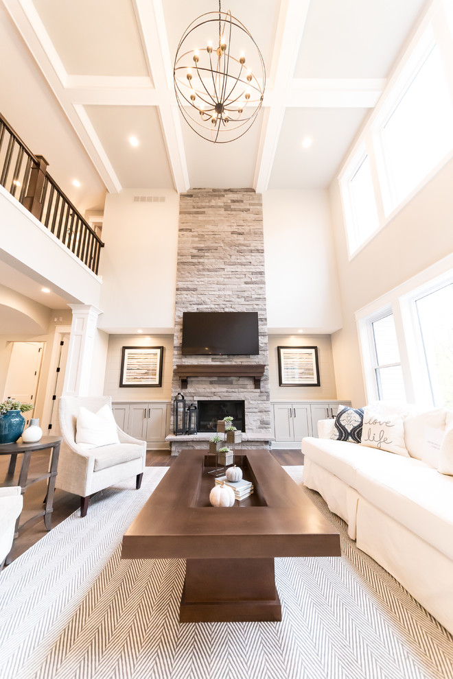Living Room Remodel Featuring a Ledgestone Fireplace + Cabinetry + Shaw Coretec - Transitional ...