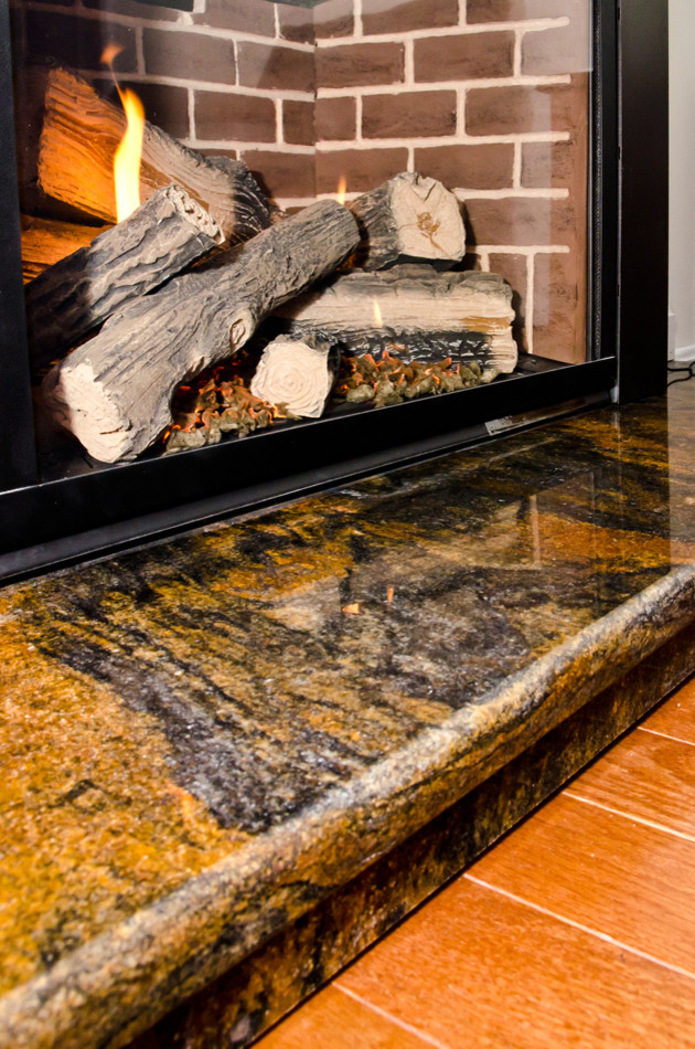 Magma Gold Granite Fireplace Surround - Modern - Living Room - DC Metro ...