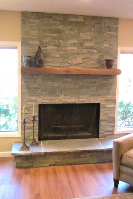 refaced fireplace with black walnut mantle, raised floors with luxury ...
