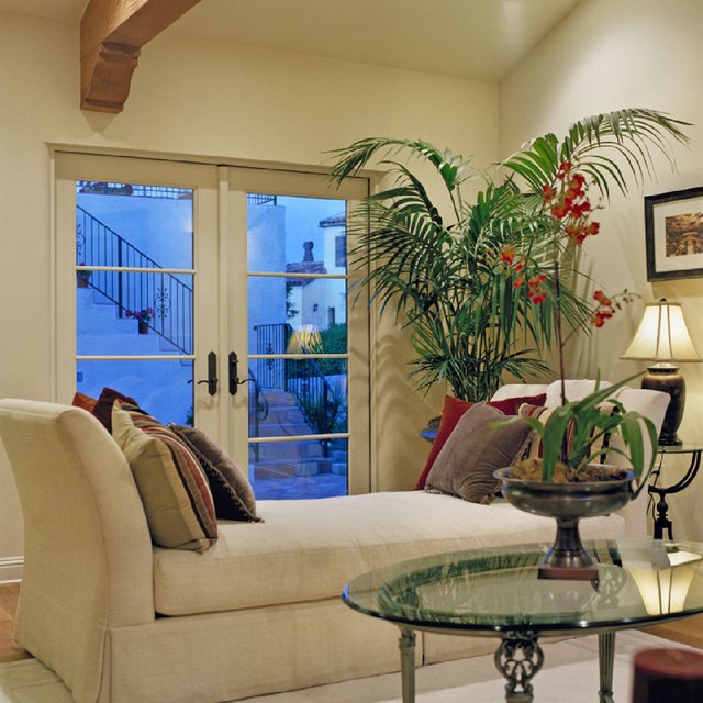 the living room with a view of the entry patio - Mediterranean - Living ...