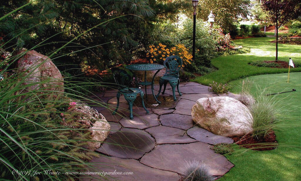 A small stone seating area - Rustic - Patio - Newark - by User | Houzz