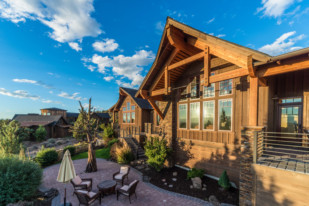 Brasada Ranch home exterior showing lower pavered deck area - Rustic ...