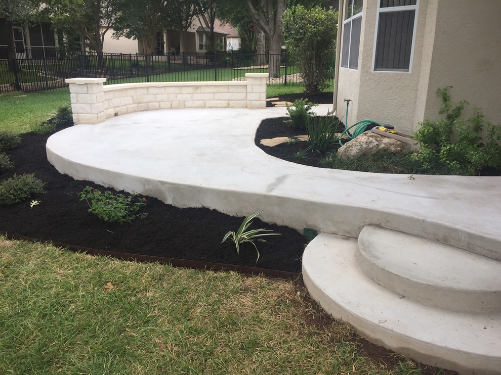 Concrete patio w/ limestone seatwalls and columns - Traditional - Patio ...