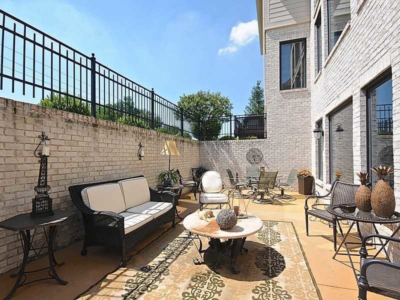 Courtyard Patio of a European Brick and Stone Home - Traditional ...