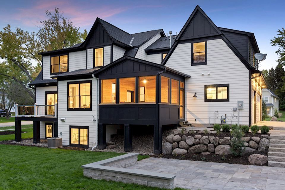 Exterior Elevation at Twilight - Farmhouse - Patio - by Adriatic ...