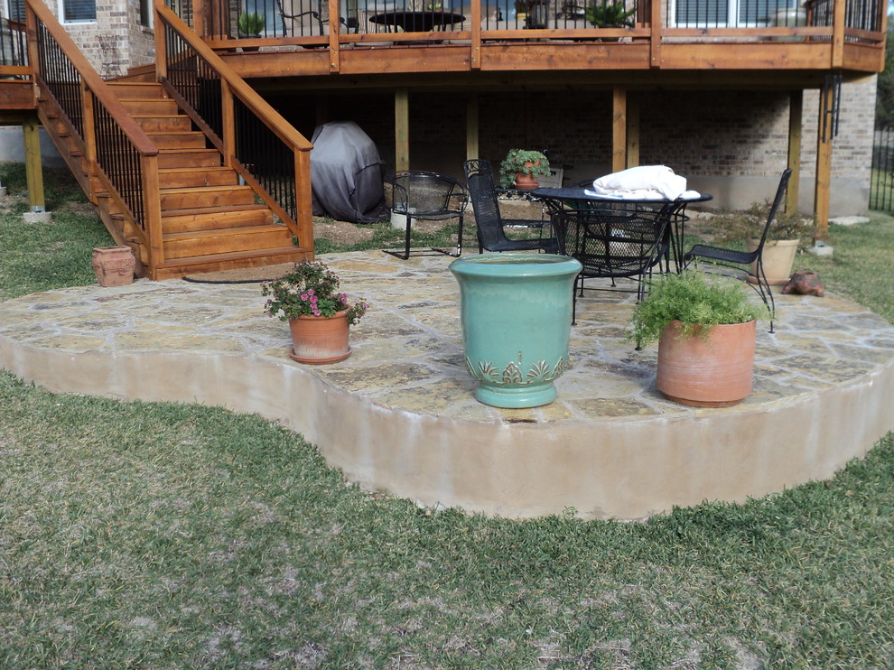 Garapa decking with Oklahoma stone patio and Cedar Pergola ...