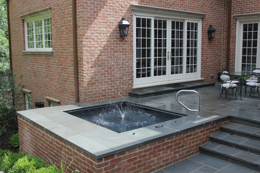 Lake Forest, IL Spa with brick walls and stone patio - Traditional ...