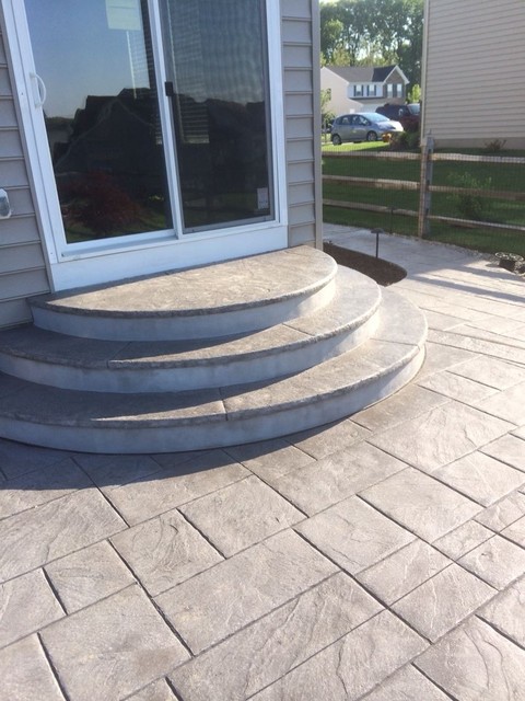 Large ashlar slate stamped patio and bullnose radius steps ...